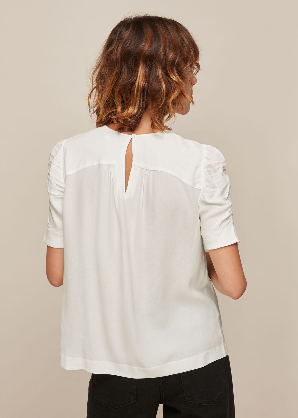 white shell top